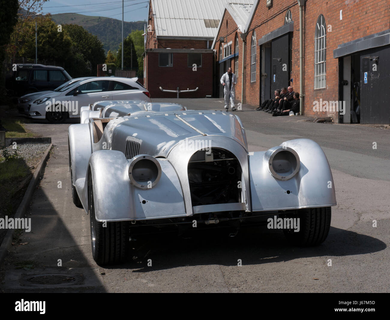 Morgan autos in line awaiting entry into the factory paint shop. Each ...