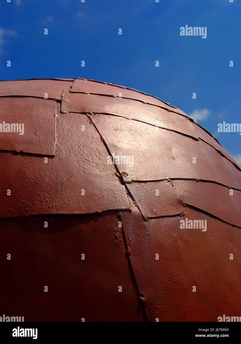 monument industry metal rust globe planet earth world firmament sky ...