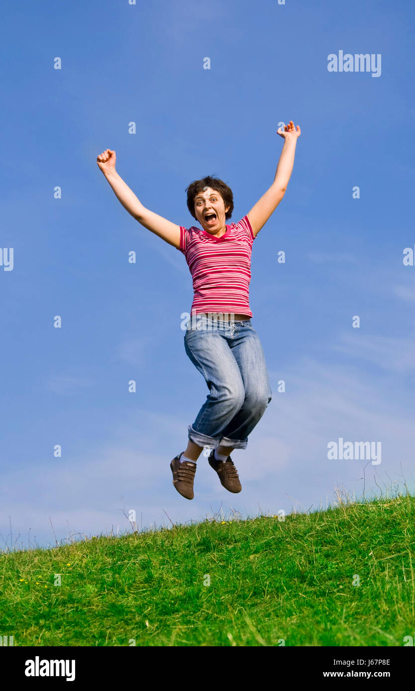 woman spring bouncing bounces hop skipping frisks jumping jump high ...