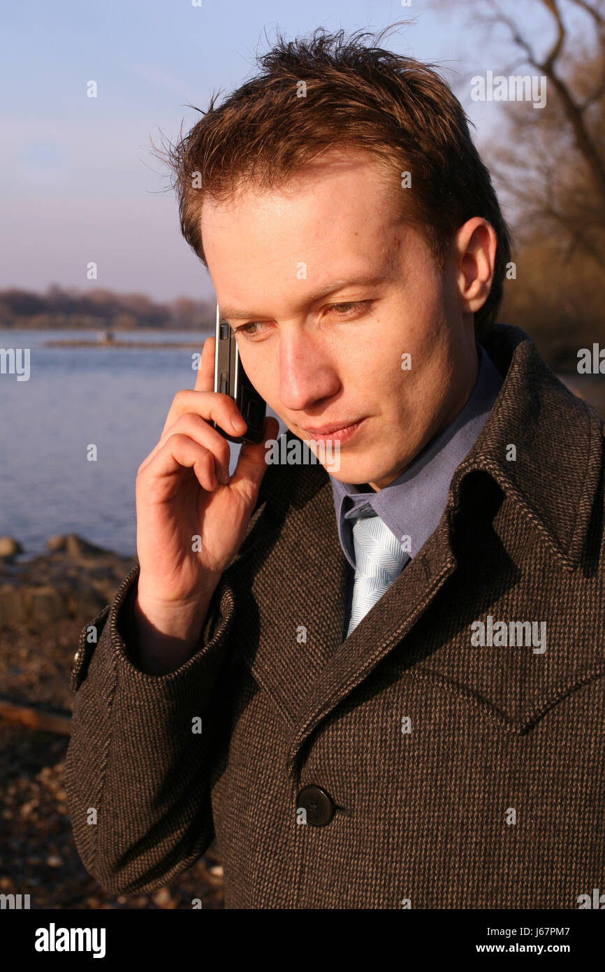 serious man telephoned outdoors Stock Photo - Alamy