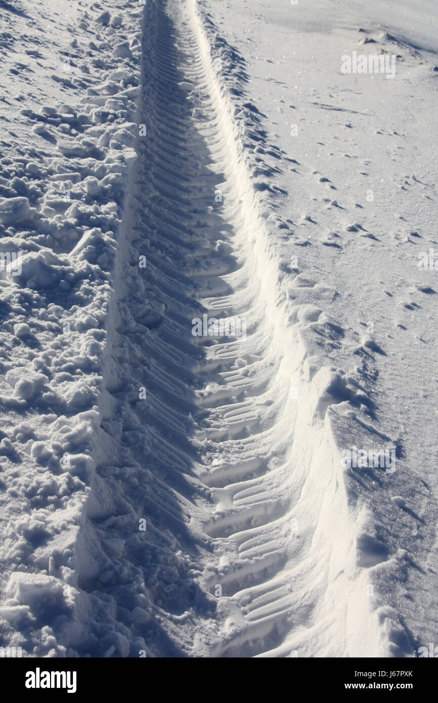 winter track deep tyre track snow winter cold shine shines bright ...