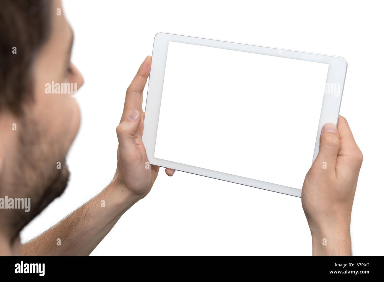 Looking over the shoulder of a man working on a horizontal tablet Stock ...