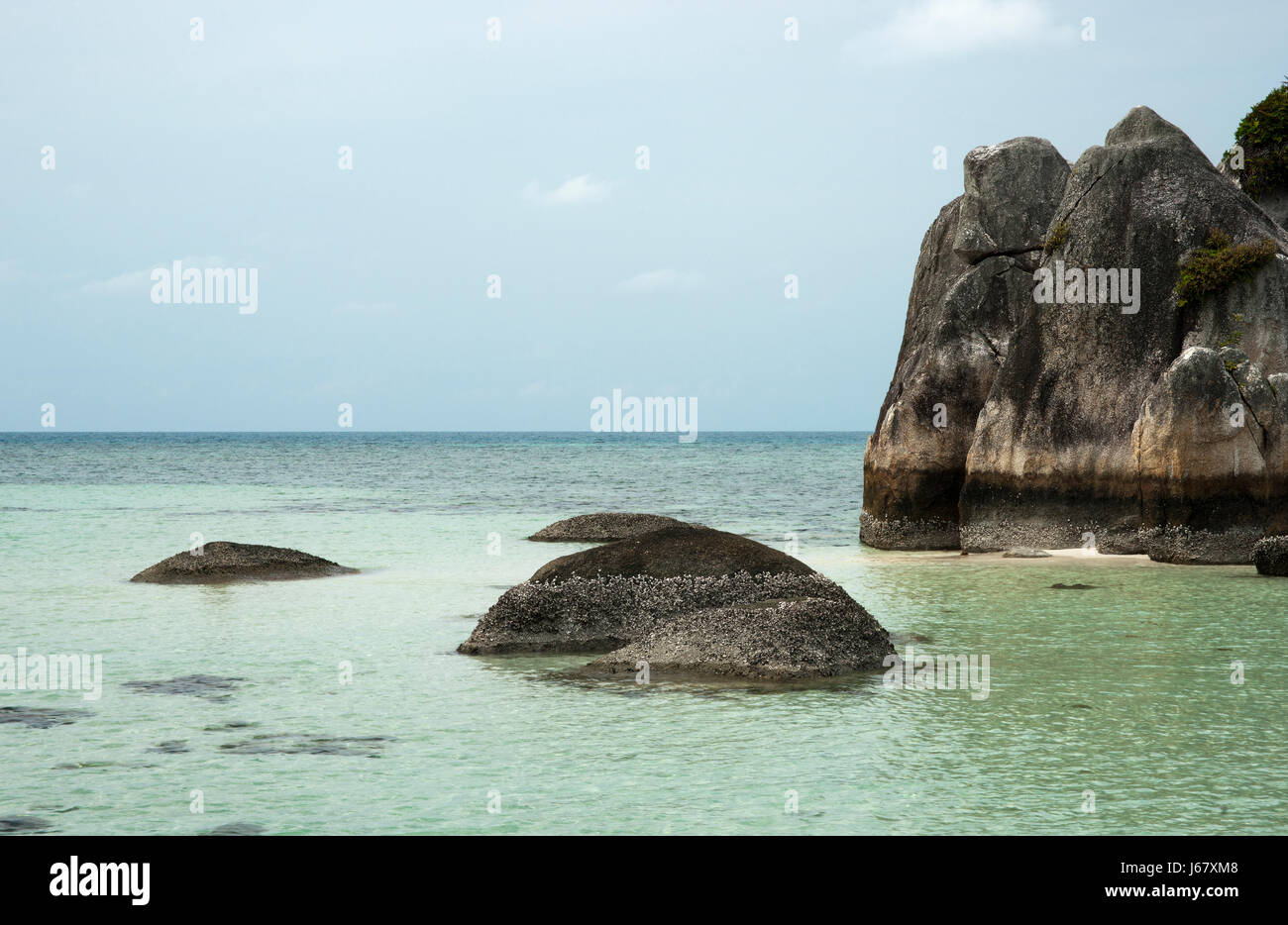 Natural coast rock formation in sea at Belitung Island in the afternoon ...