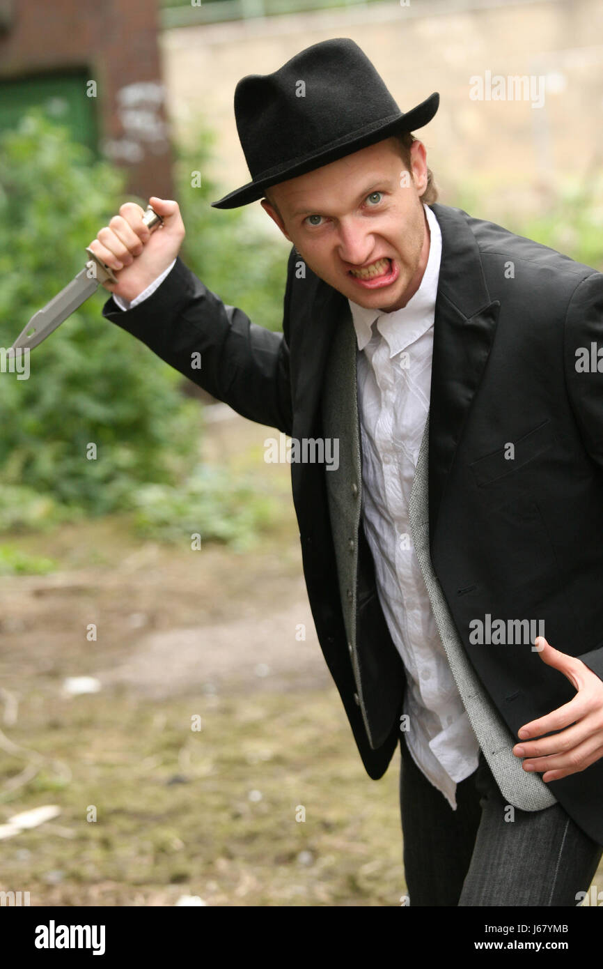 raving furious angry irately killer arm weapon knive knife man danger ...