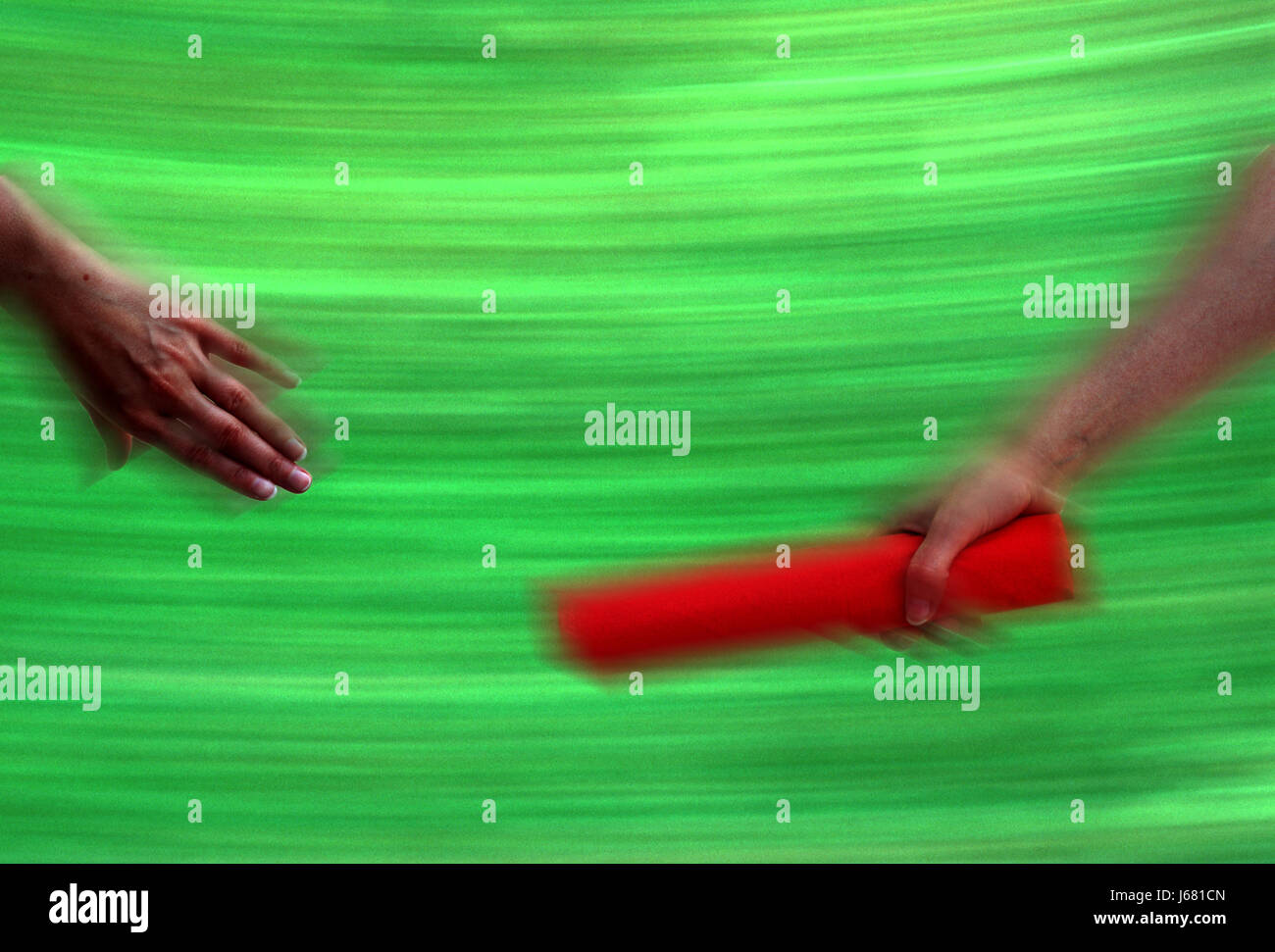 Baton handover hi-res stock photography and images - Alamy