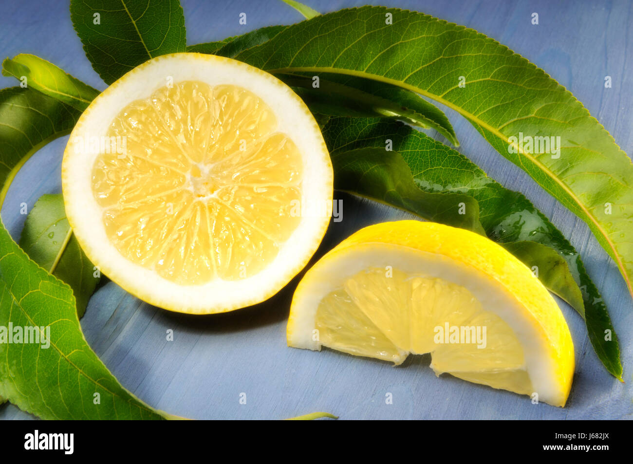 attached lemon with leaves Stock Photo - Alamy