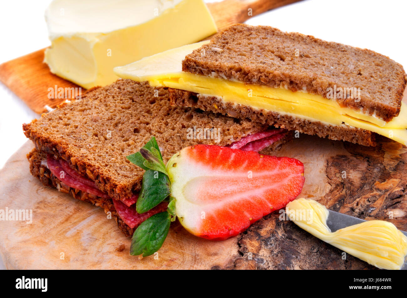 folding sandwiches with sausage and cheese Stock Photo - Alamy
