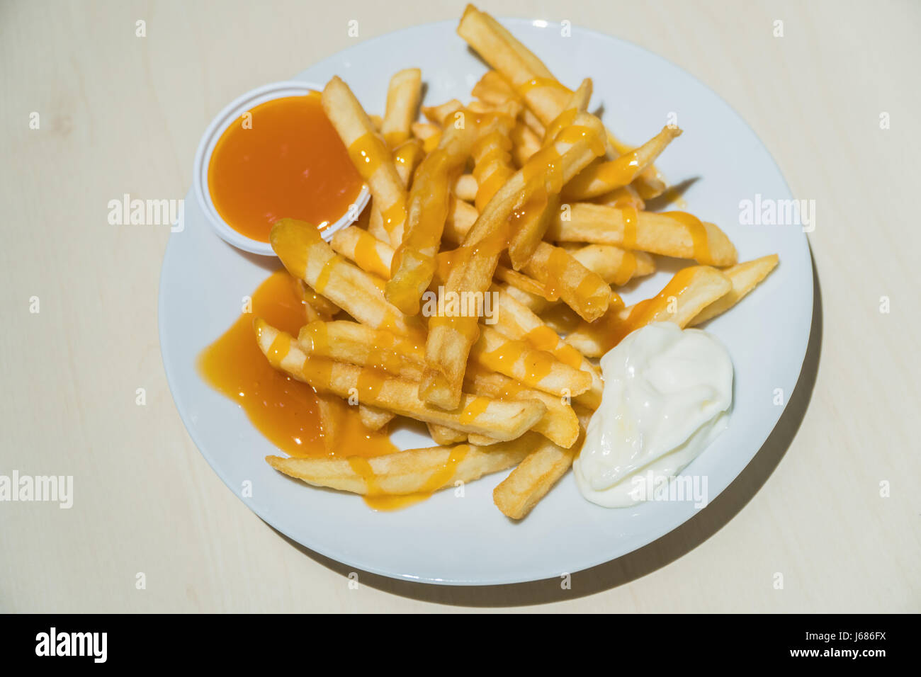 French fries and ketchup at the restaurant Stock Photo - Alamy