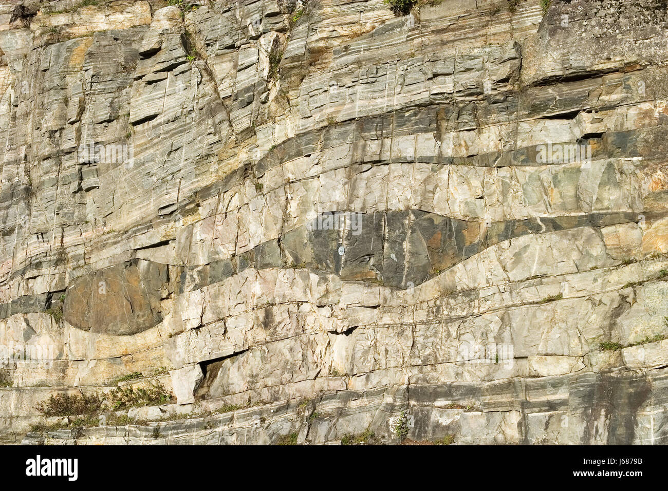 stone brown brownish brunette contrast rough formation rock wall row ...