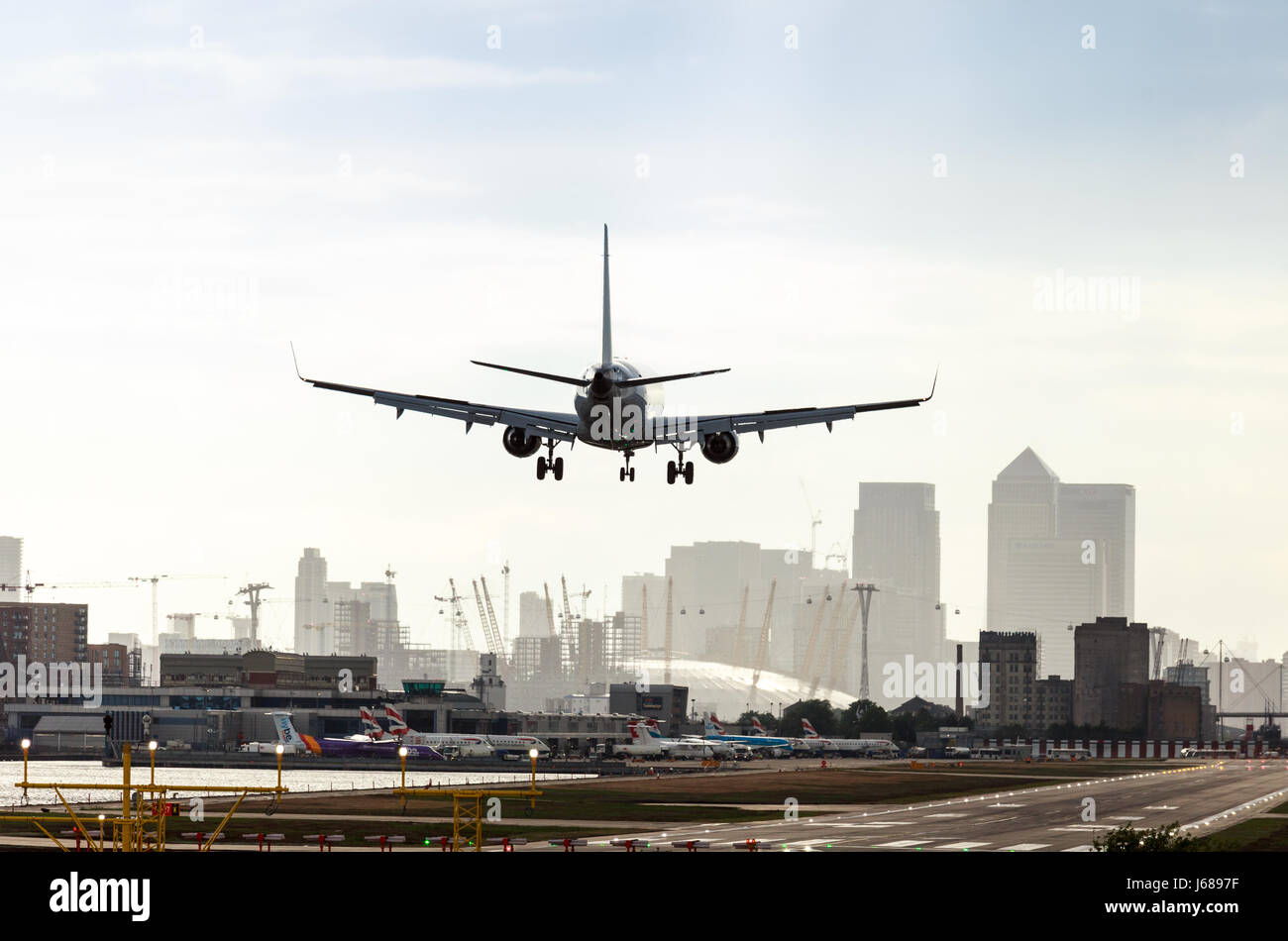 Yellow plane landing hi-res stock photography and images - Alamy