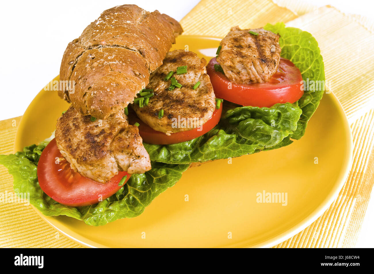 belegtes wholemeal rolls with pork,lettuce,tomatoes and peppers on ...