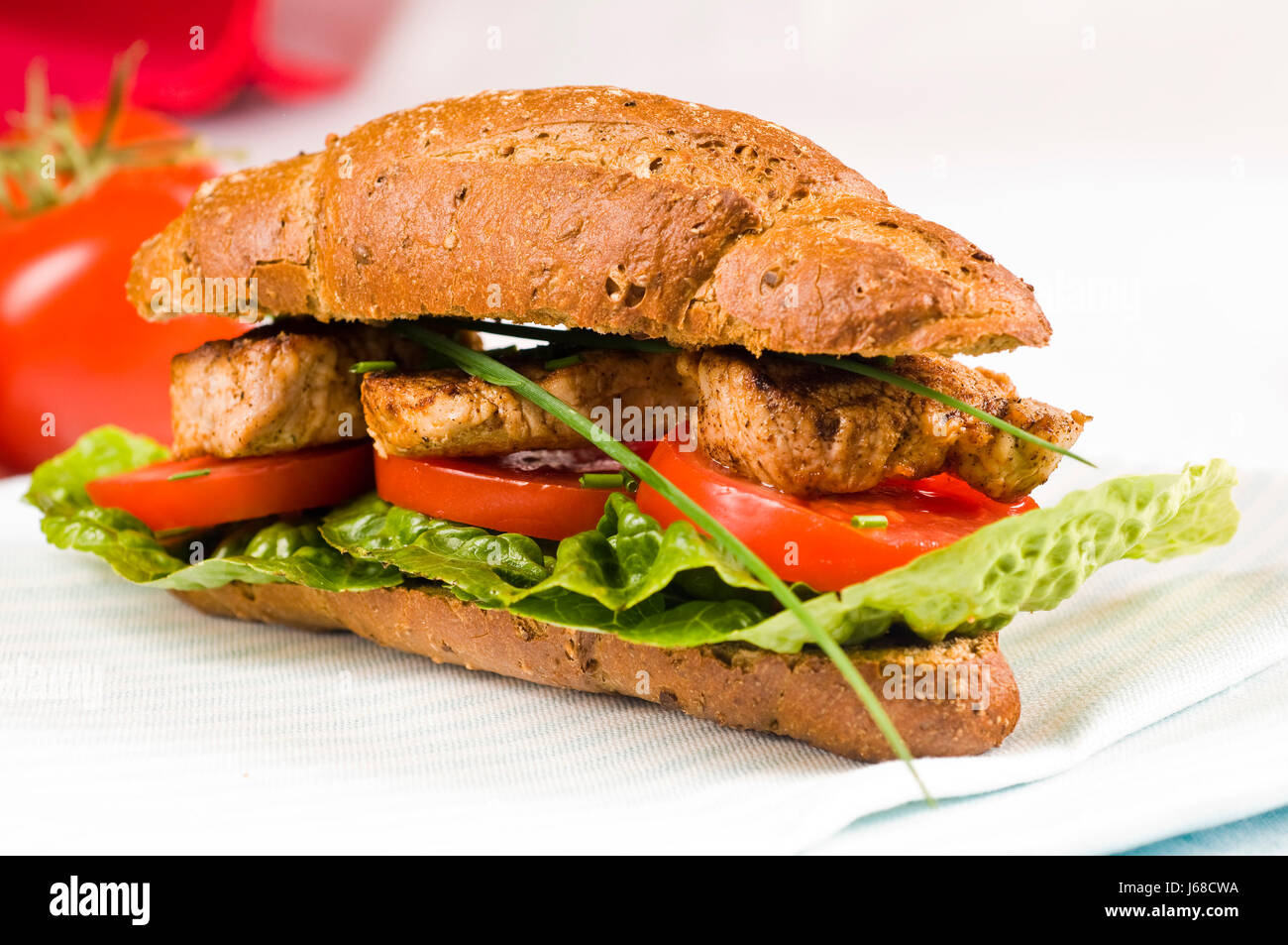 belegtes wholemeal rolls with pork,lettuce,tomatoes and peppers Stock ...