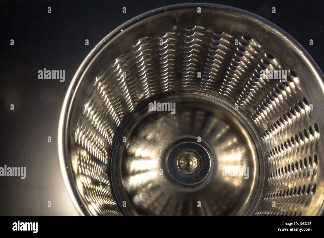Close up of round grater Stock Photo - Alamy