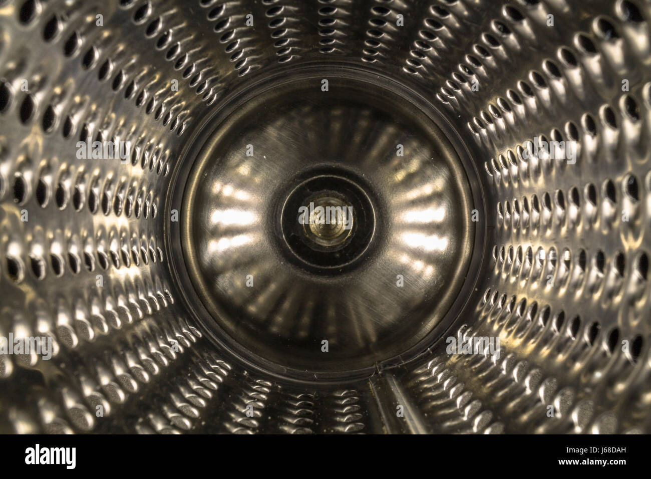 Close up of round grater Stock Photo - Alamy