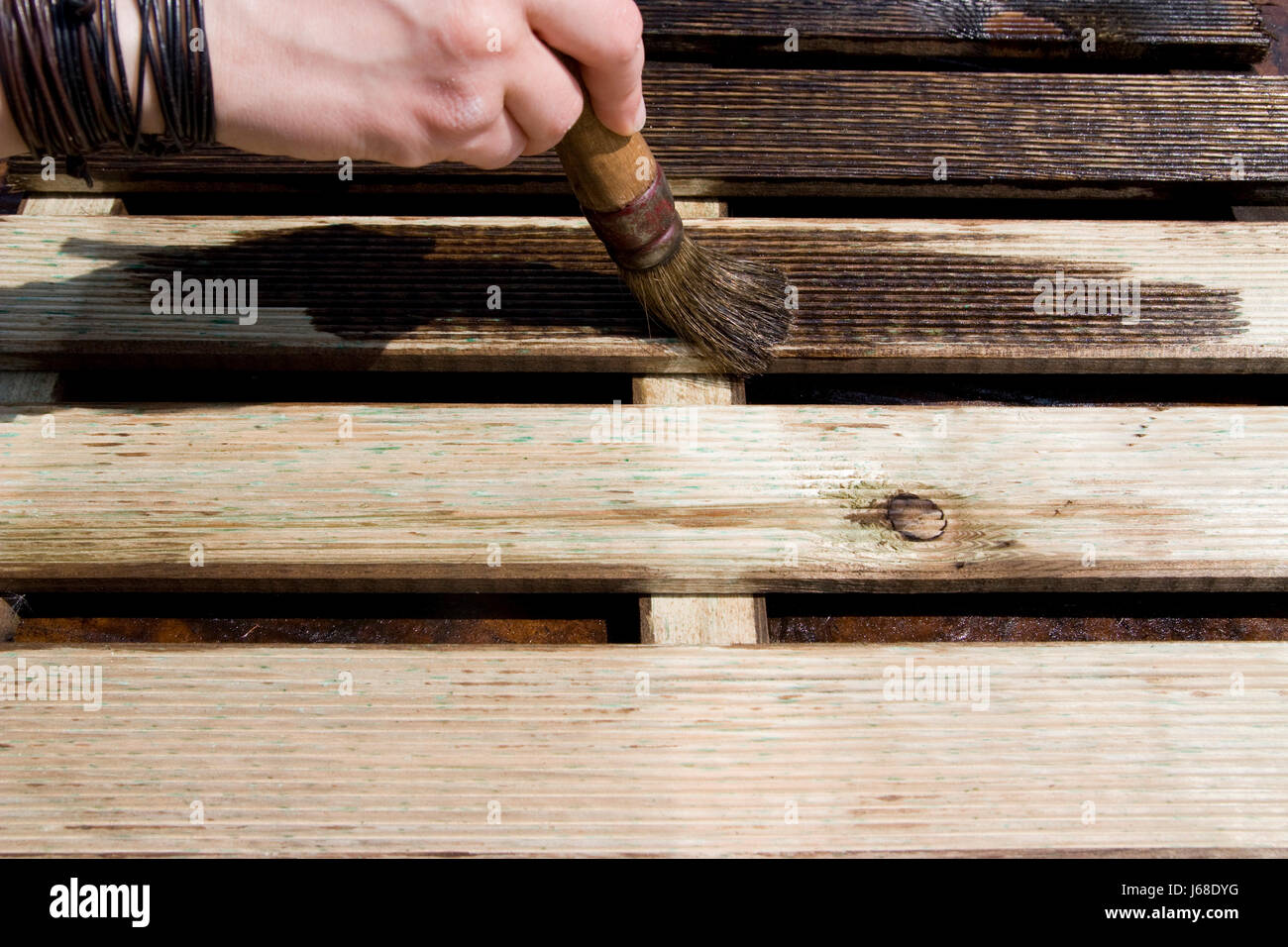 wood spread brush timber wax paintbrush brushing hand work craftsman ...