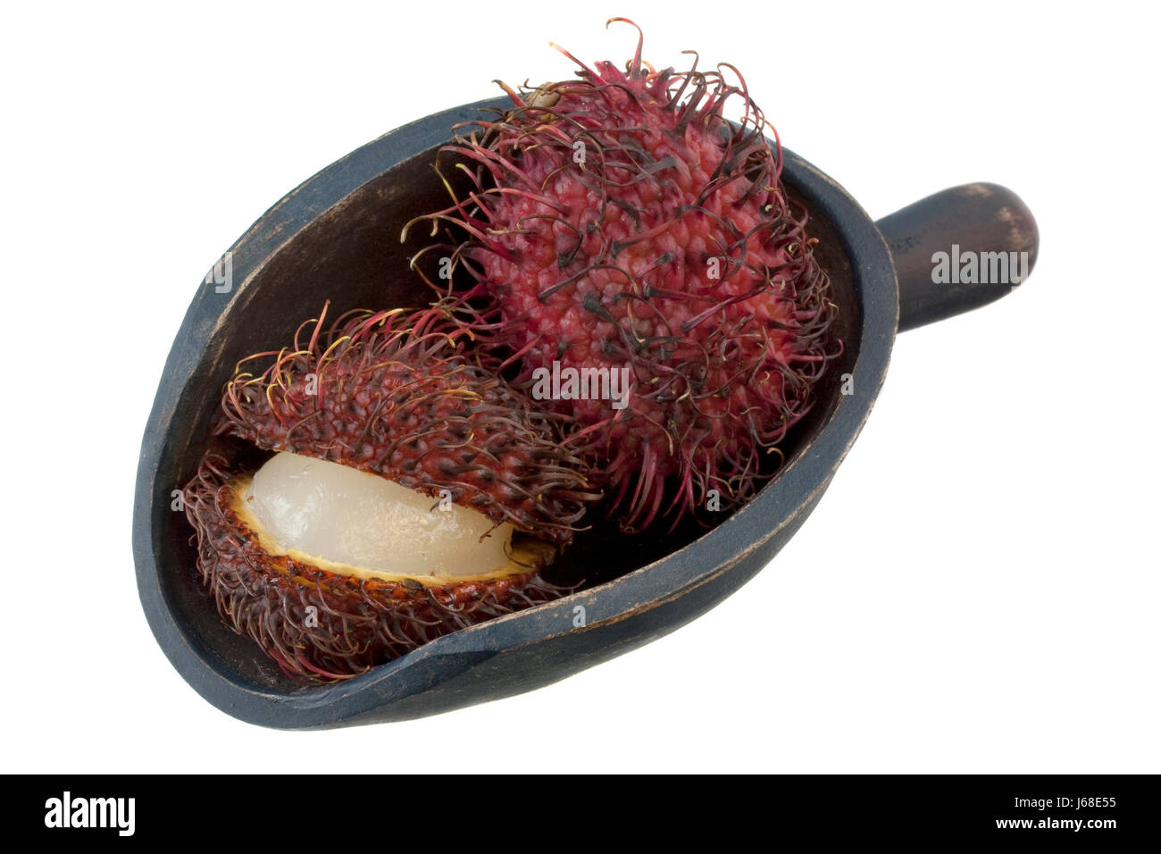 hairy fruit scoop red wood hairy horizontal fruit cut tropical nobody ...