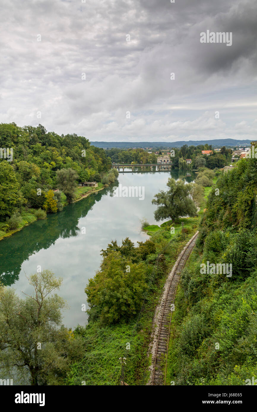 Cloudy river landscape Stock Photo - Alamy
