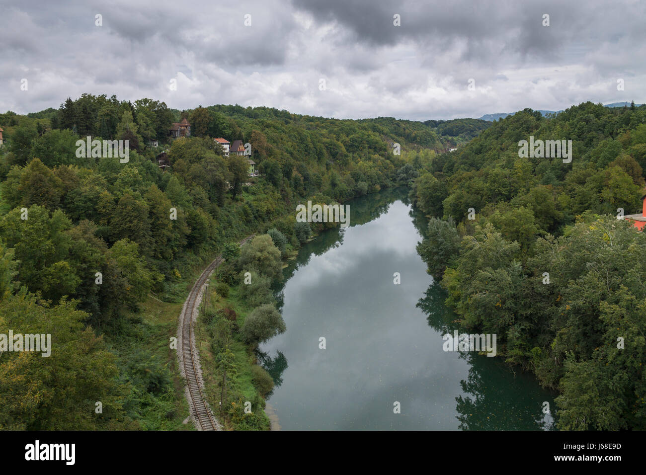 Cloudy river landscape Stock Photo - Alamy
