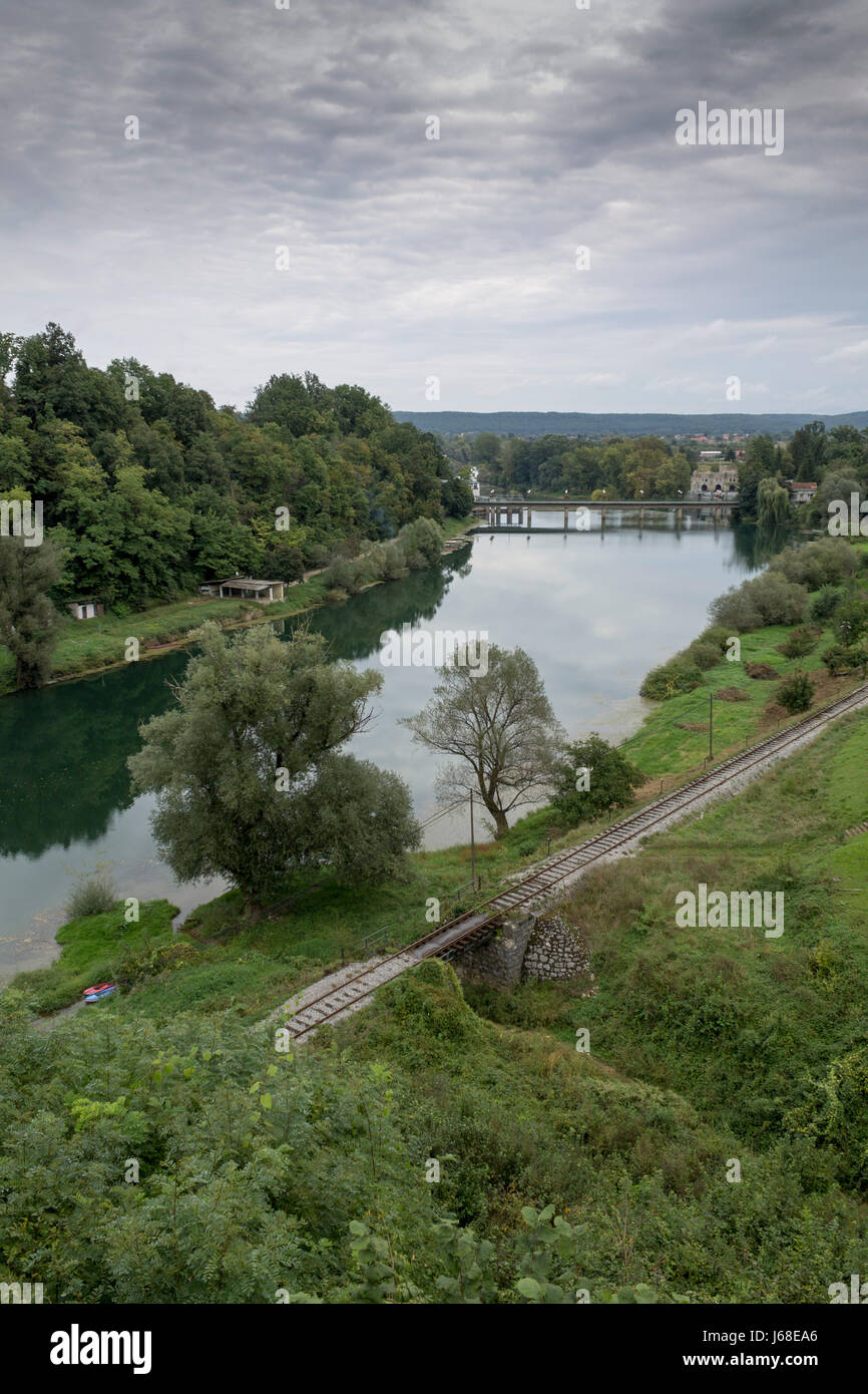 Cloudy river landscape Stock Photo - Alamy