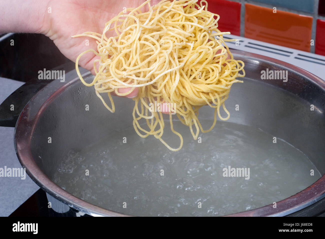 kitchen cuisine boil cooks boiling cooking noodles spaghetti hand steam ...