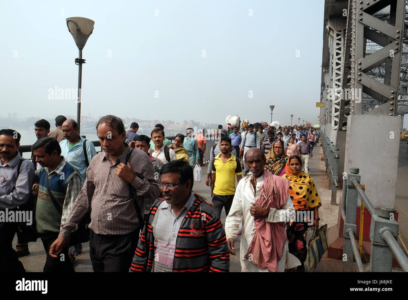 Morning rush hour, people crossing the Howrah bridge, Kolkata, India ...