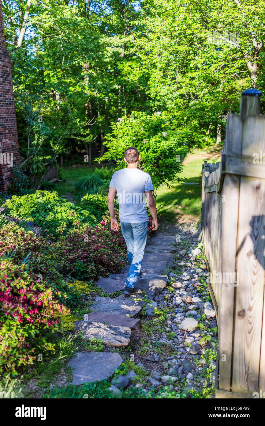 Man walking through rocks hi-res stock photography and images - Alamy
