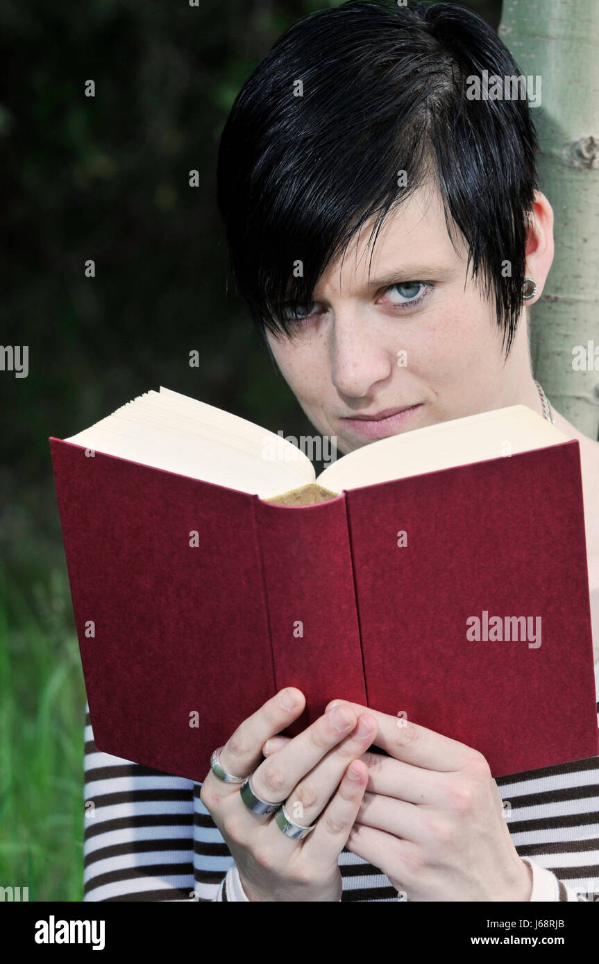 woman with book Stock Photo - Alamy