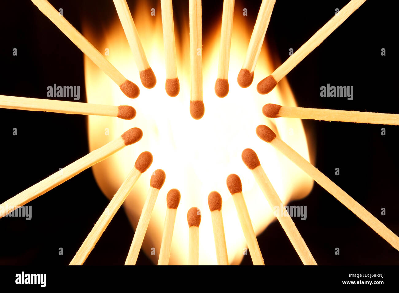 burning matches in heart form Stock Photo - Alamy
