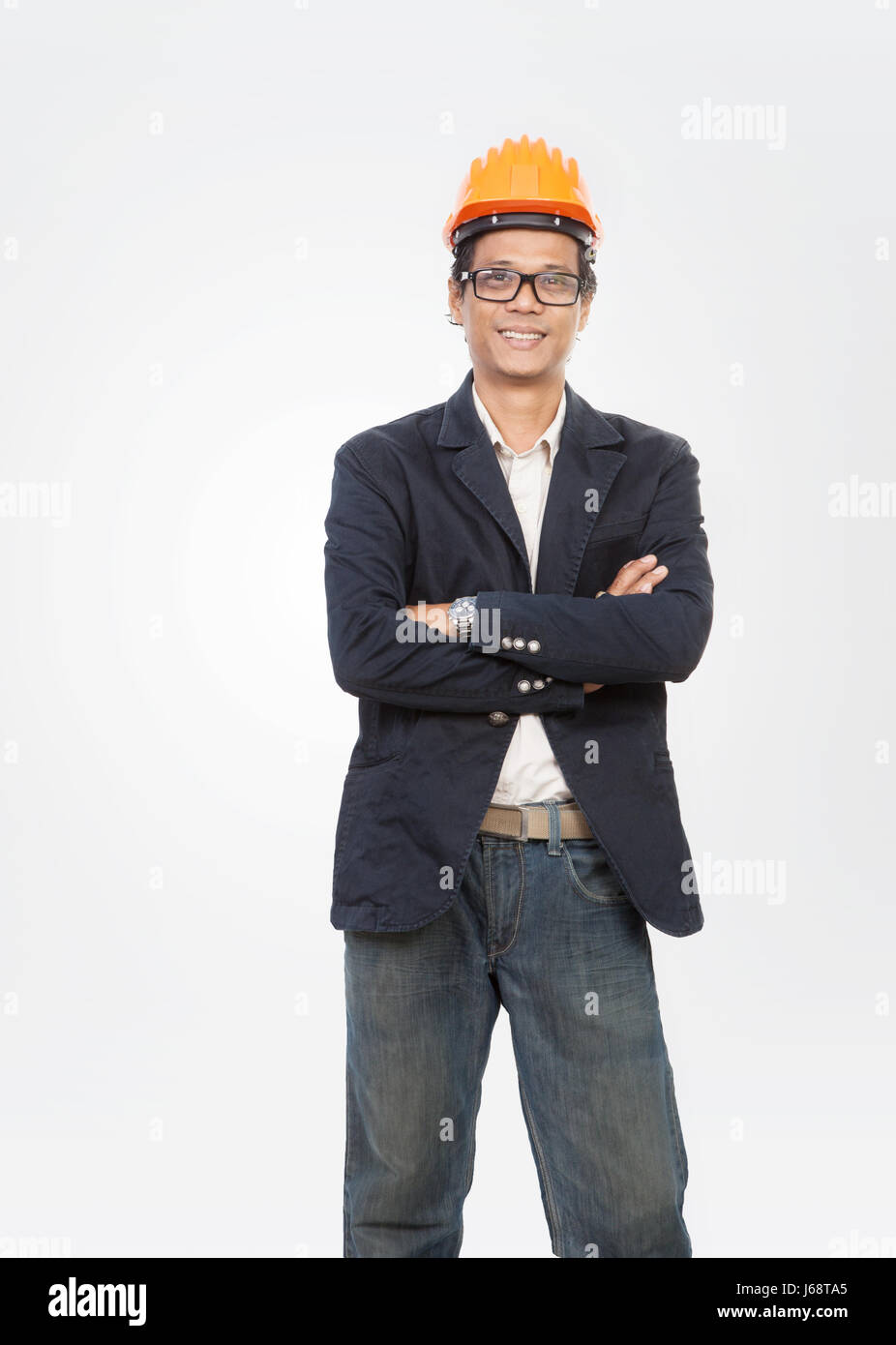 portrait of young engineer man standing with smiling face isolated ...