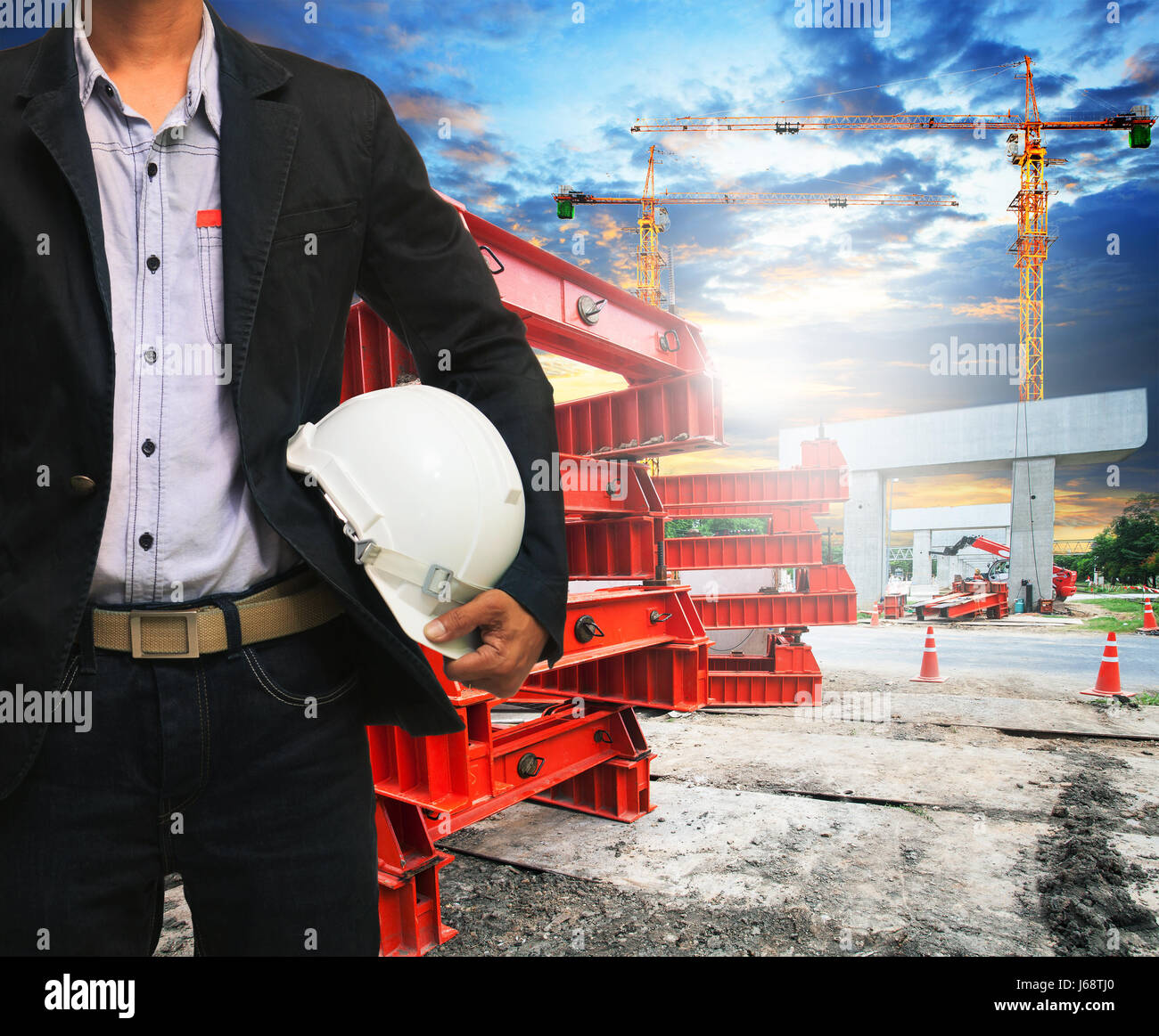 engineer man with safety helmet working in road and bridge construction ...