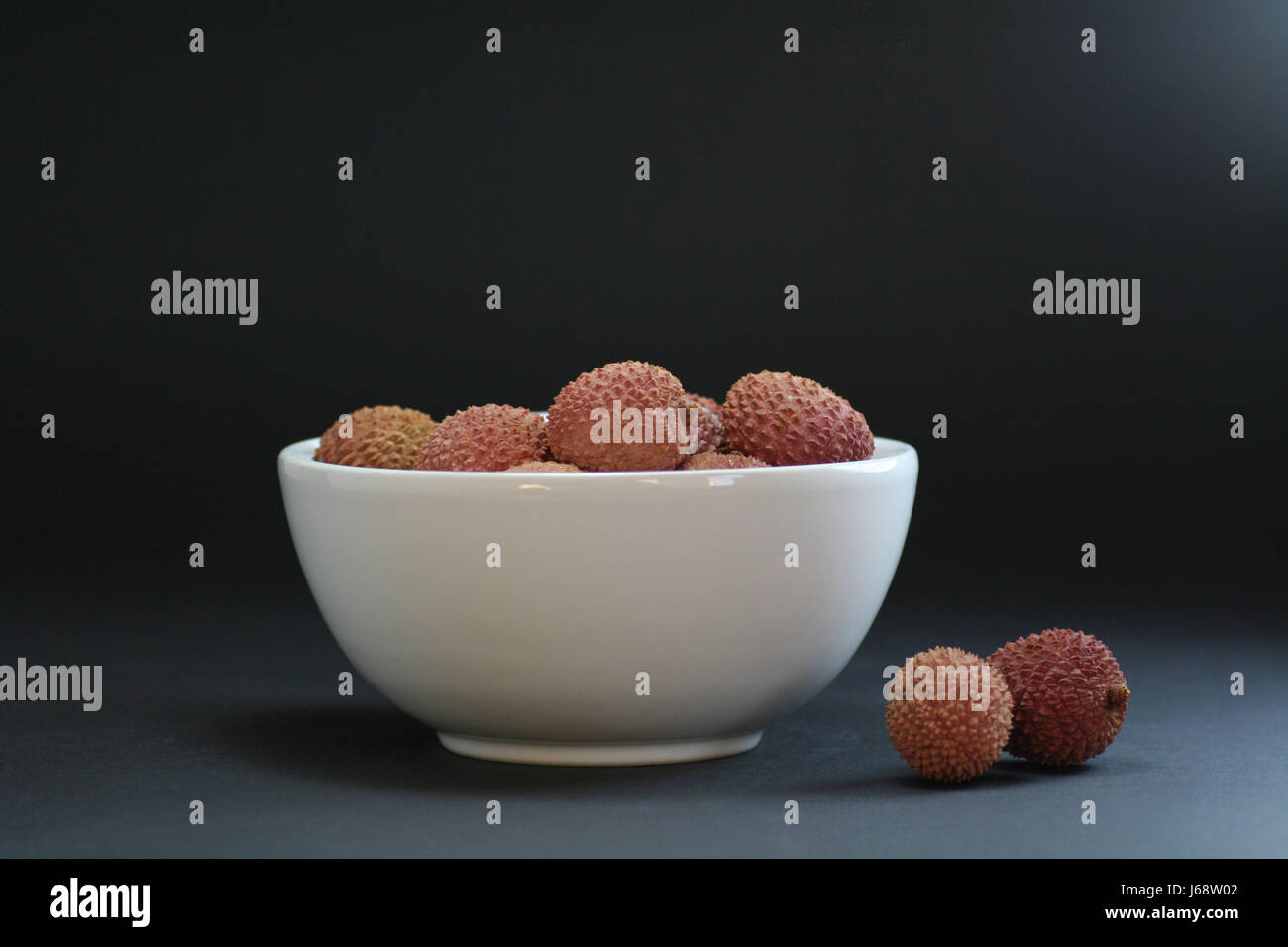lychees in shell Stock Photo - Alamy