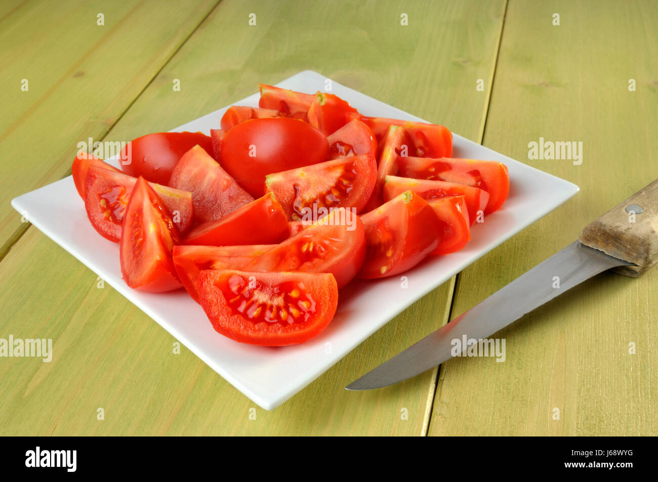 food aliment vegetable tomatoes tomatos quarter arm weapon knive knife ...
