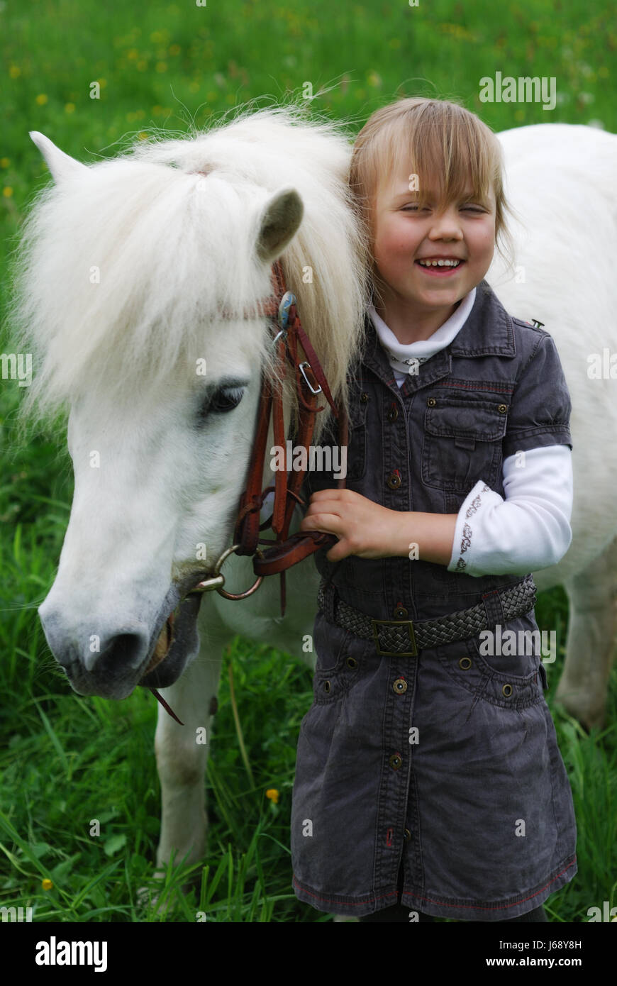 Child pony laughing hi-res stock photography and images - Alamy