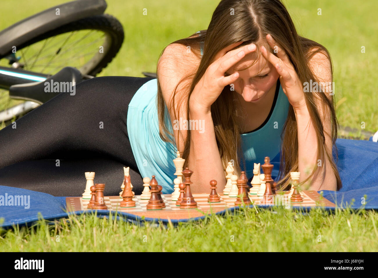 woman sport sports game tournament play playing plays played active chess bike Stock Photo - Alamy