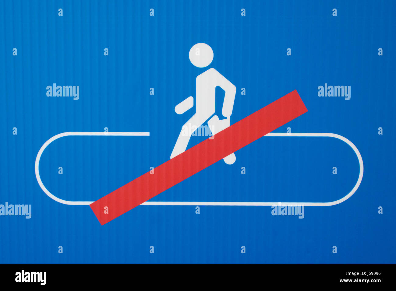 Escalator warning sign Stock Photo - Alamy