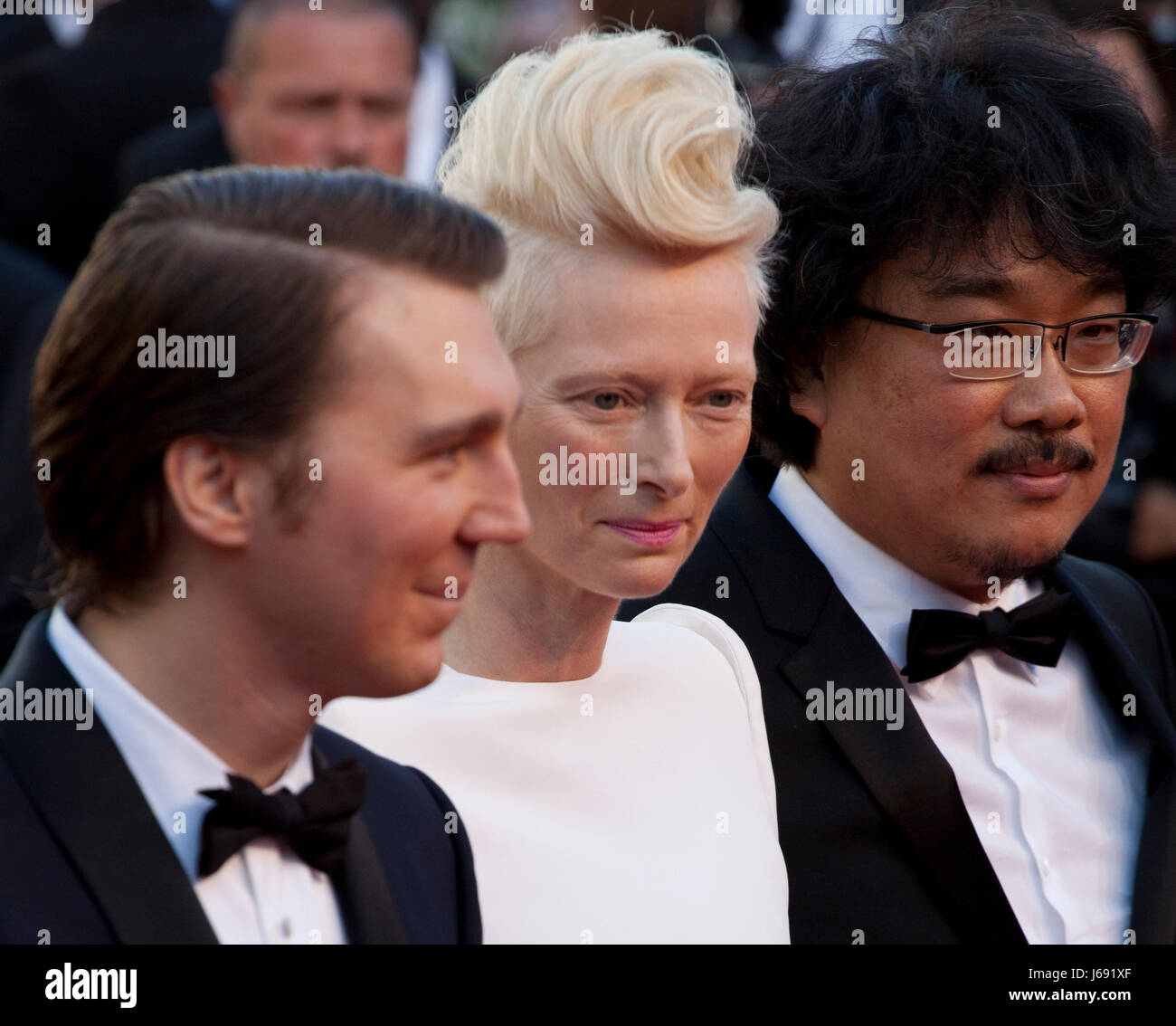 Cannes, France. 19th May, 2017. Paul Dano, Tilda Swinton and Bong Joon ...