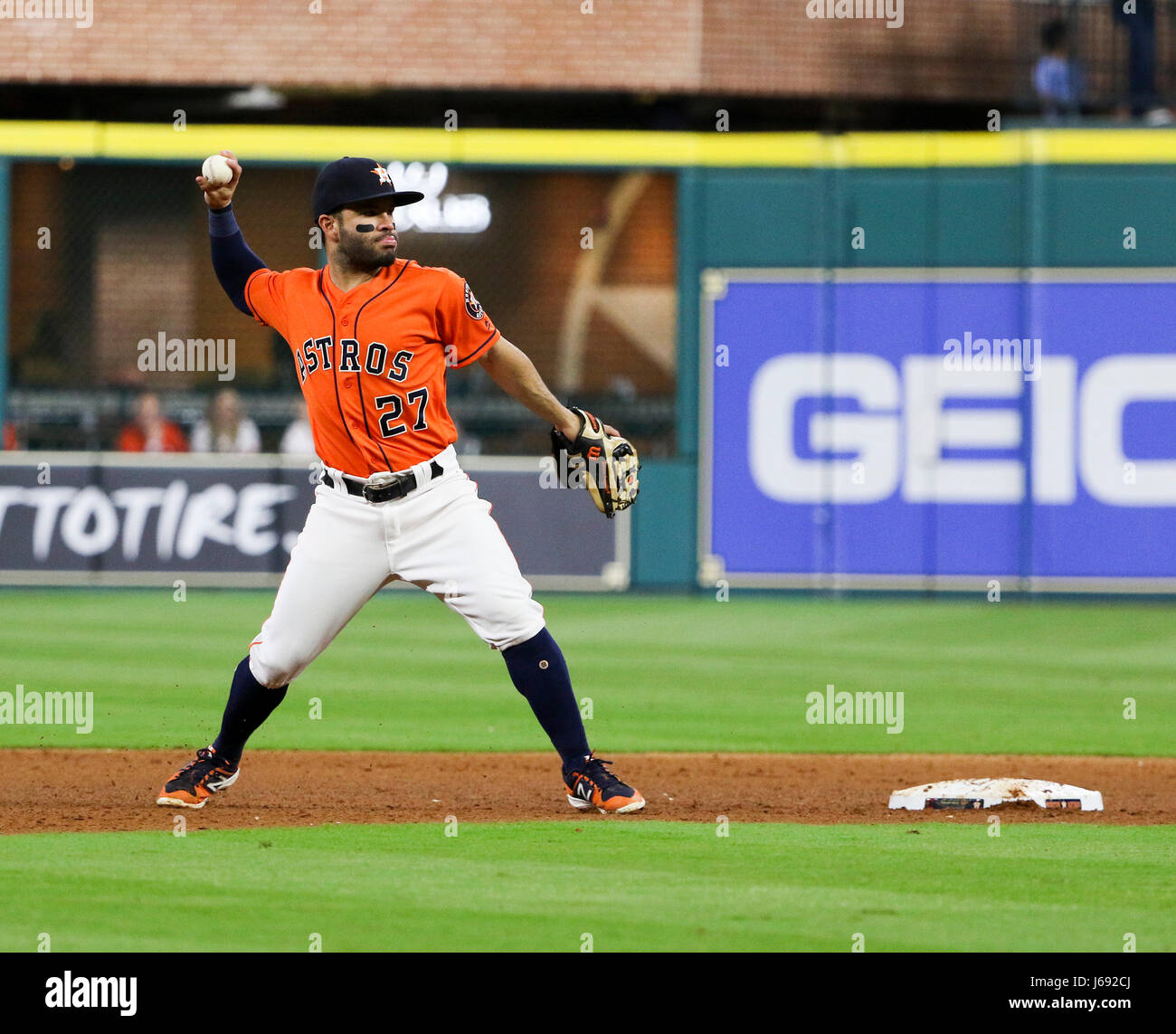 Houston, TX, USA. 19th May, 2017. Houston Astros second baseman Jose Altuve (27) makes a throw ...