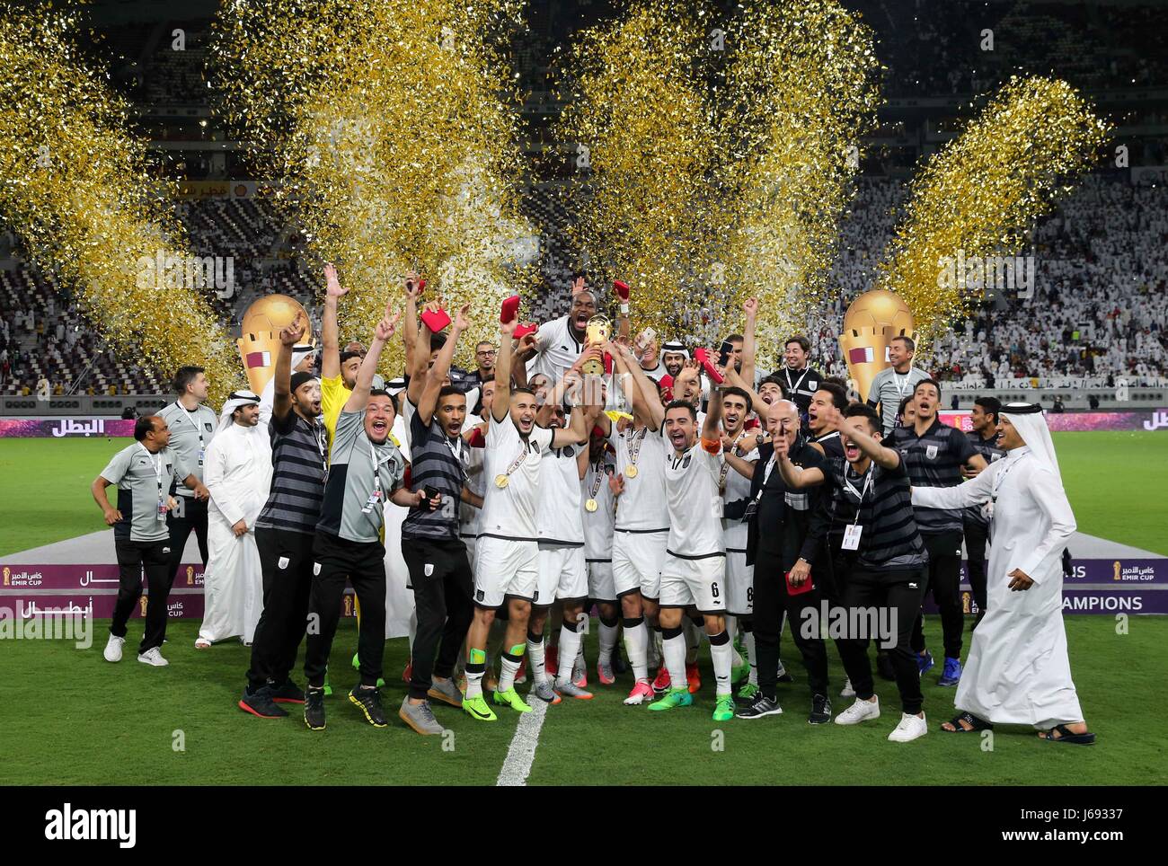 Doha, Qatar. 19th May, 2017. Members of Al-Sadd celebrate their victory ...