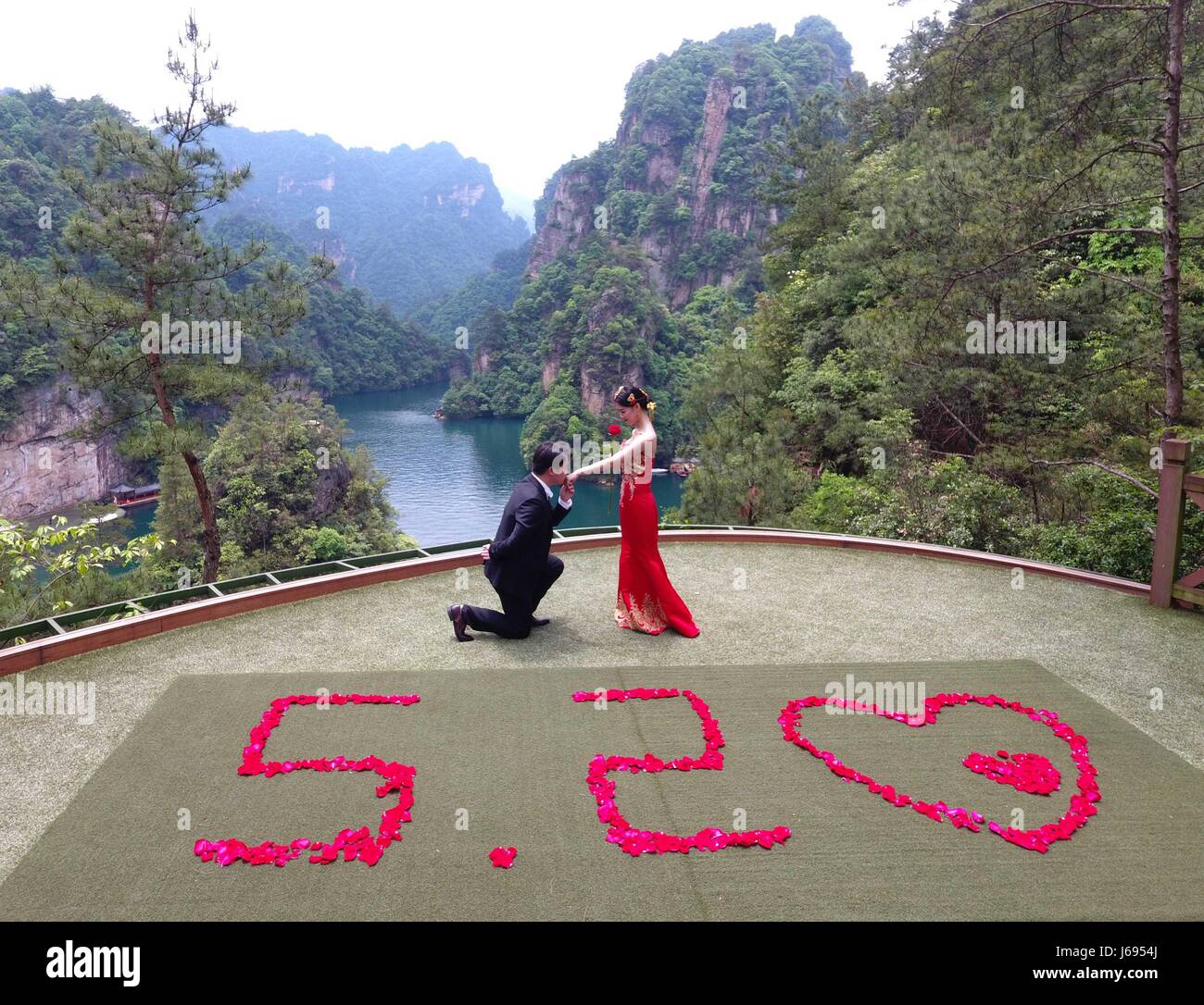 Zhangjiajie, China's Hunan Province. 20th May, 2017. A couple pose for ...