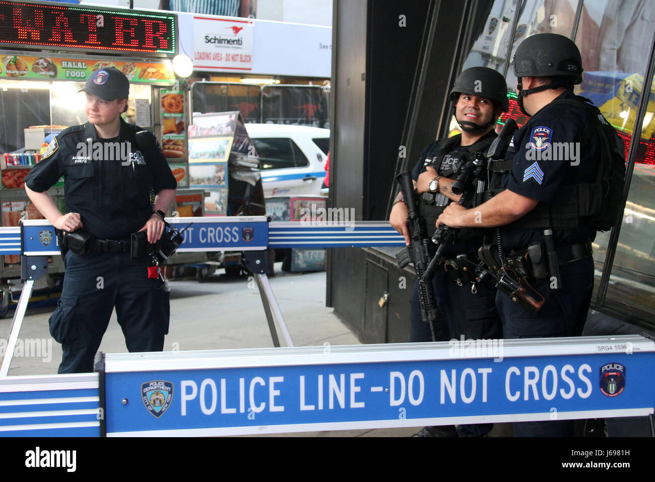 Heavily armed police officers stand hi-res stock photography and images ...