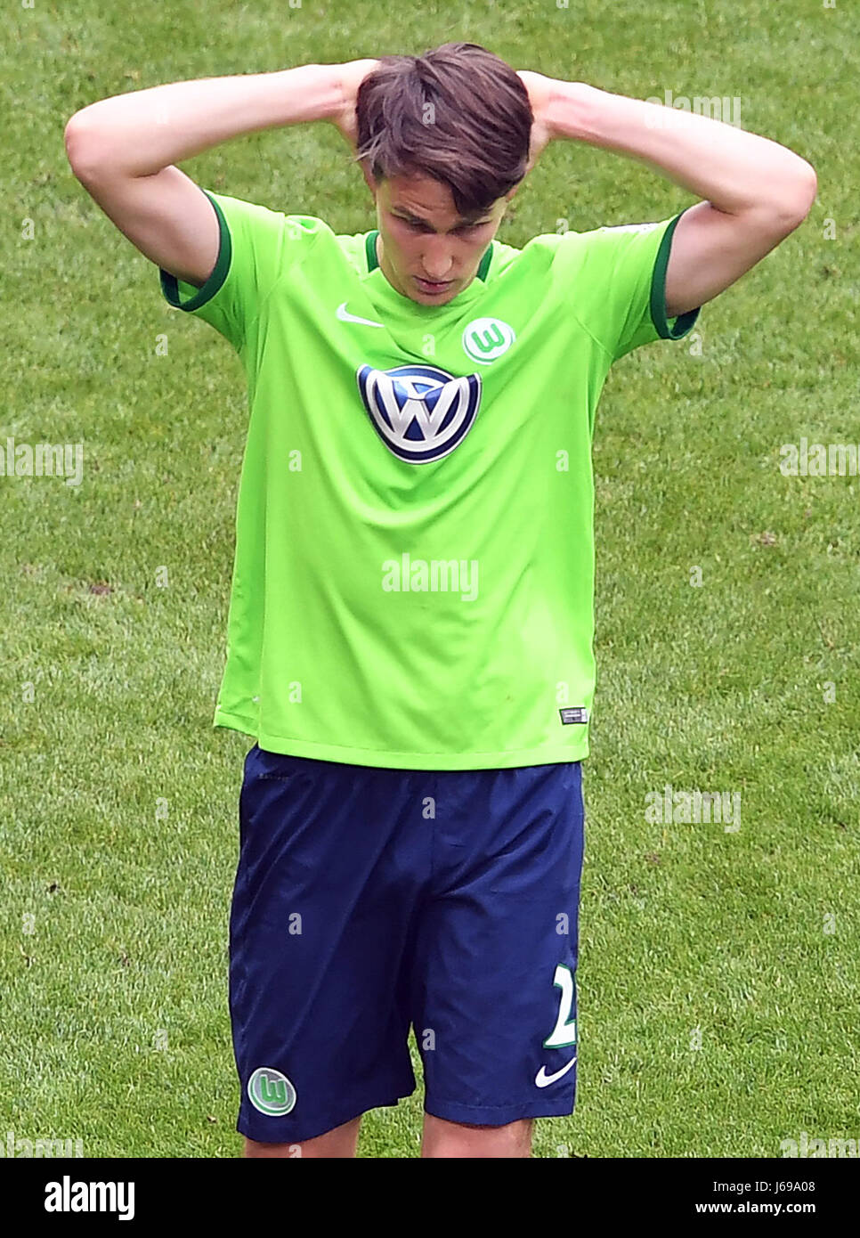 Wolfburg's Philipp Wollscheid walks off the pitch after the German ...