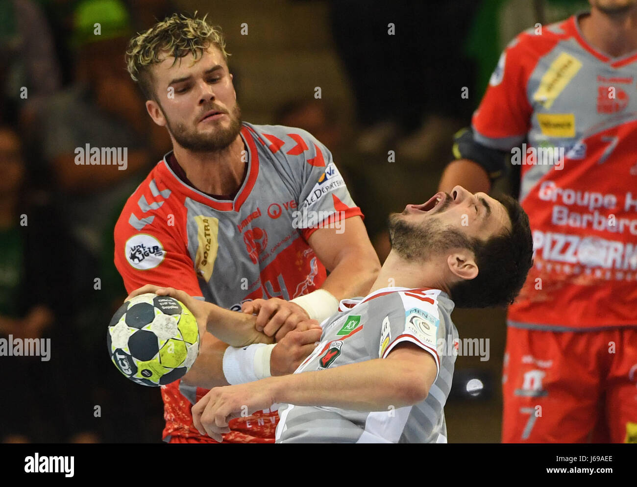 St. Raphael's Alexander Lyngaard (L) grabs Berlin's Petar Nenadic's arm ...
