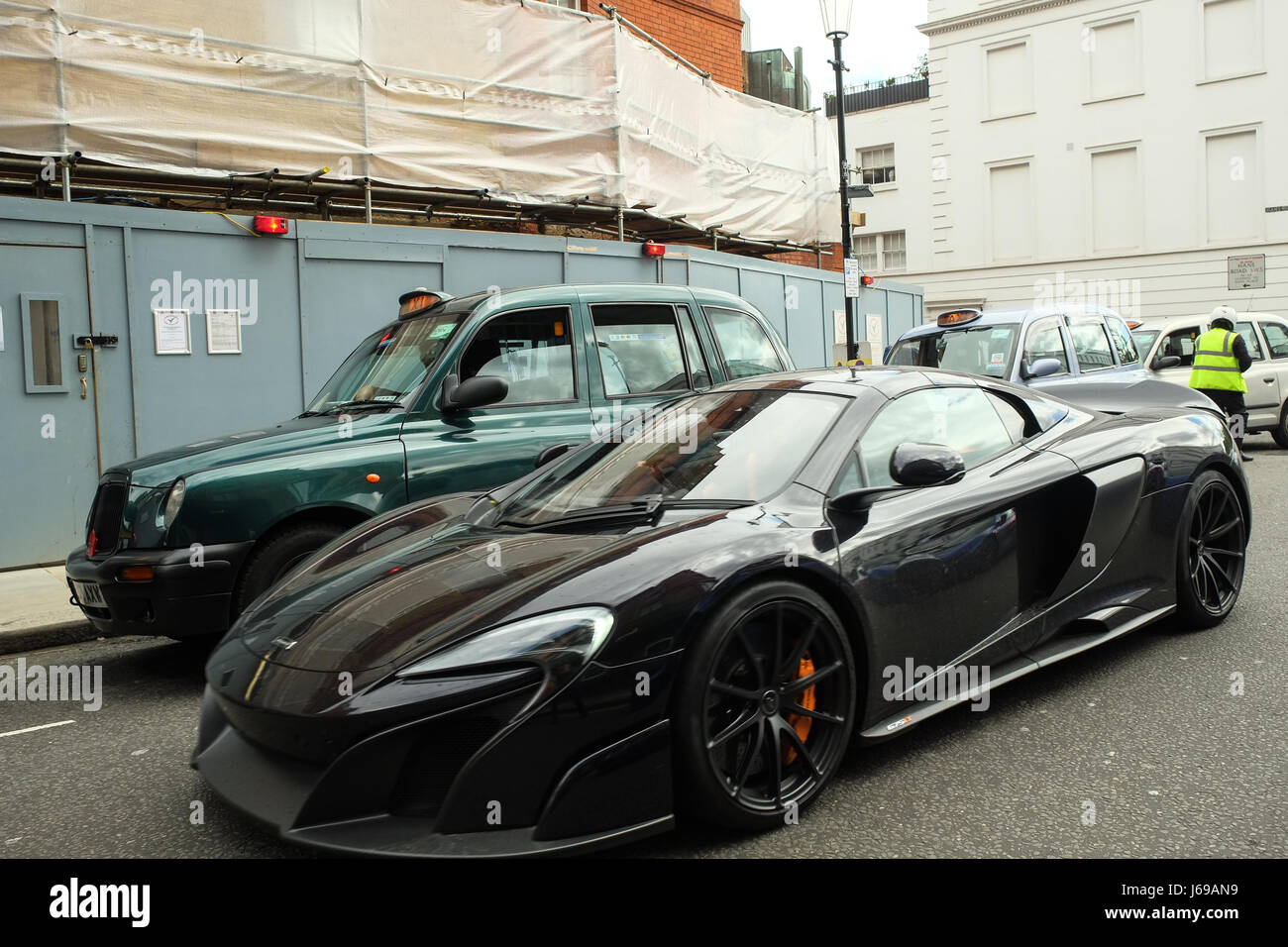 London, UK. 20th May 2017. Super cars seen outside Harrods ...