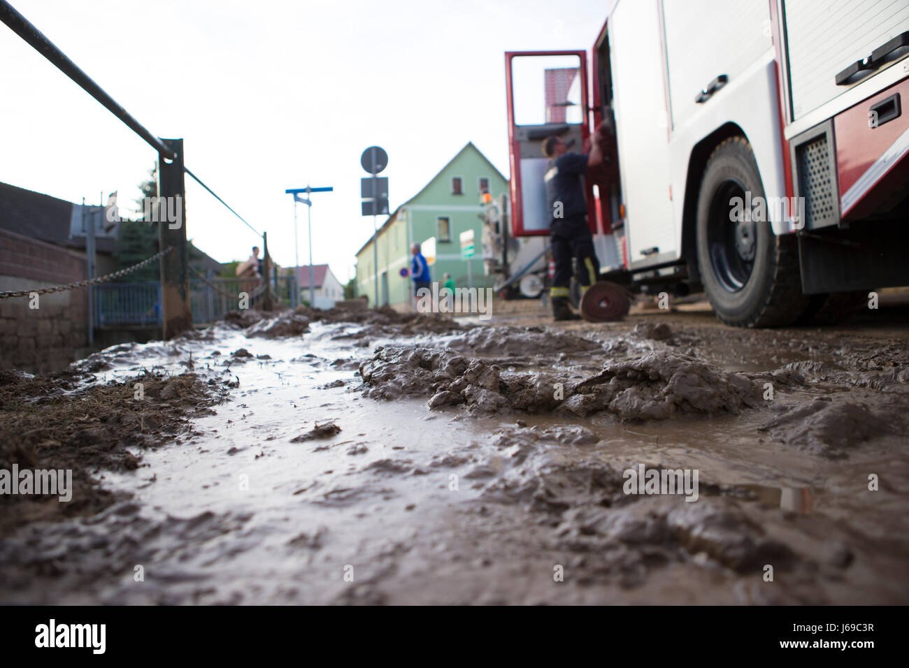 A street full of mud following a heavy storm in Bad Bibra, Germany, 20 ...