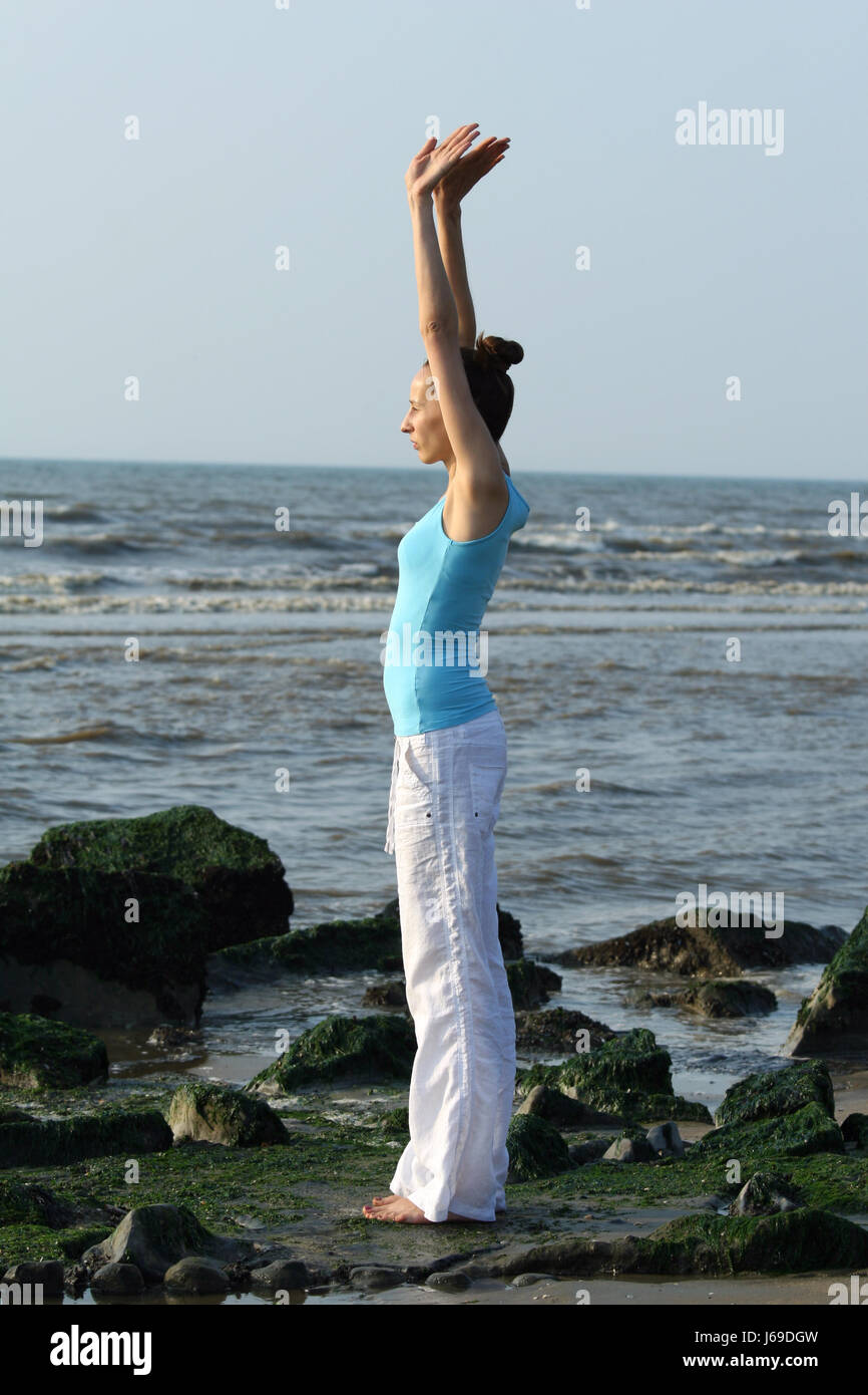 woman beach seaside the beach seashore yoga breathing fitness woman ...
