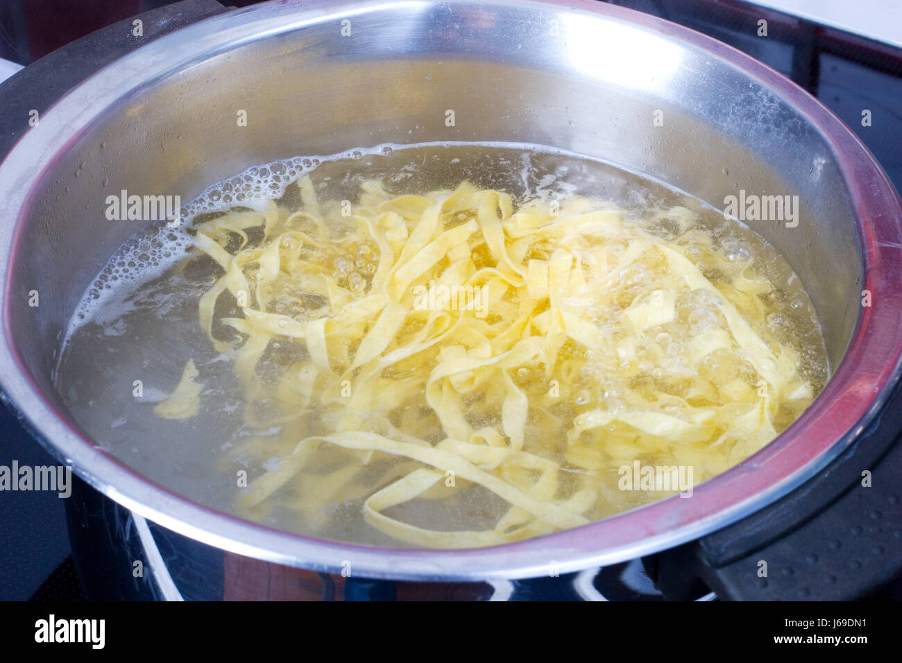 noodles in pot Stock Photo - Alamy