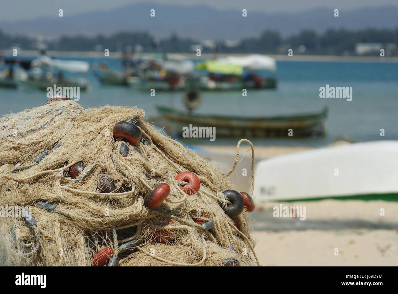 fishing net on the beach Stock Photo - Alamy