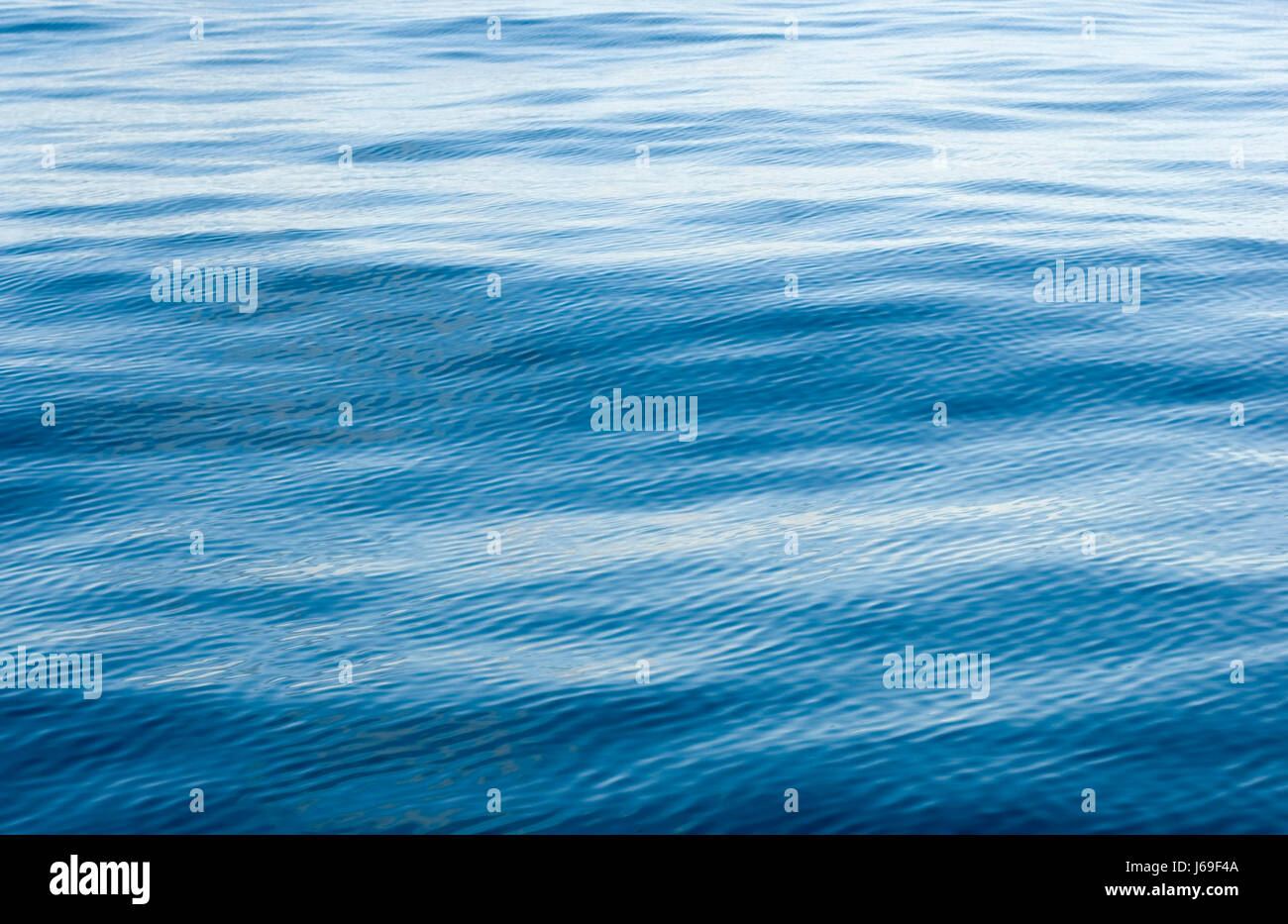 blue salt water sea ocean water wind close blue liquid reflection wave ...