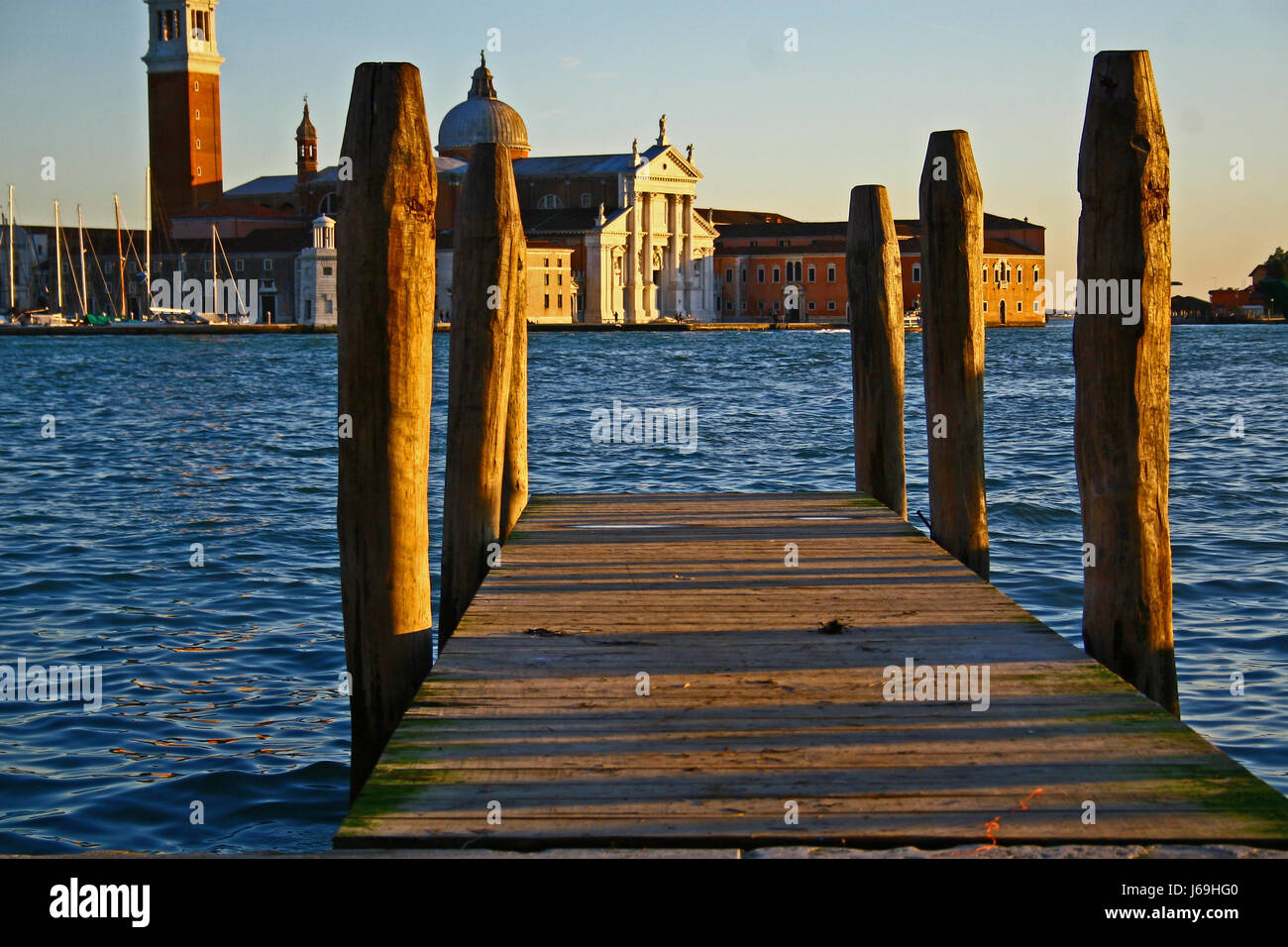 wood venice sightseeing bridge salt water sea ocean water shaddow ...