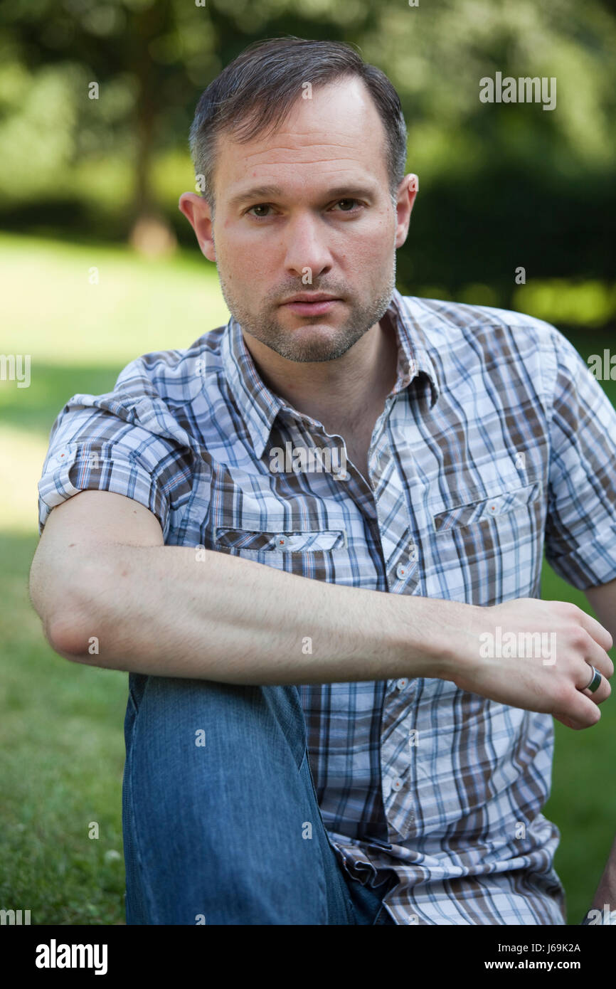 fashion park portrait outdoor adult adults put sitting sit man humans ...